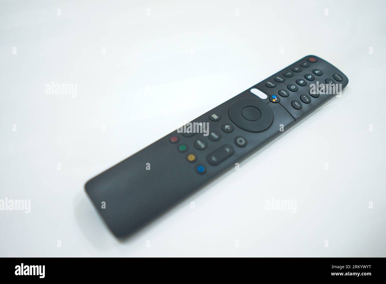 TV remote control on white background Stock Photo - Alamy