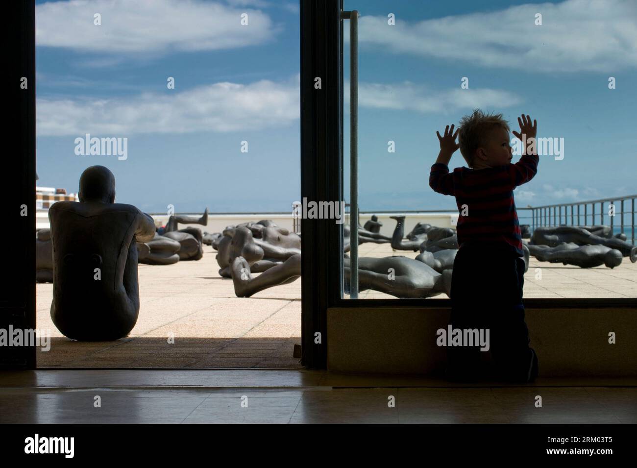 Antony Gormley's "Critical Mass", consisting of sixty life-size iron ...
