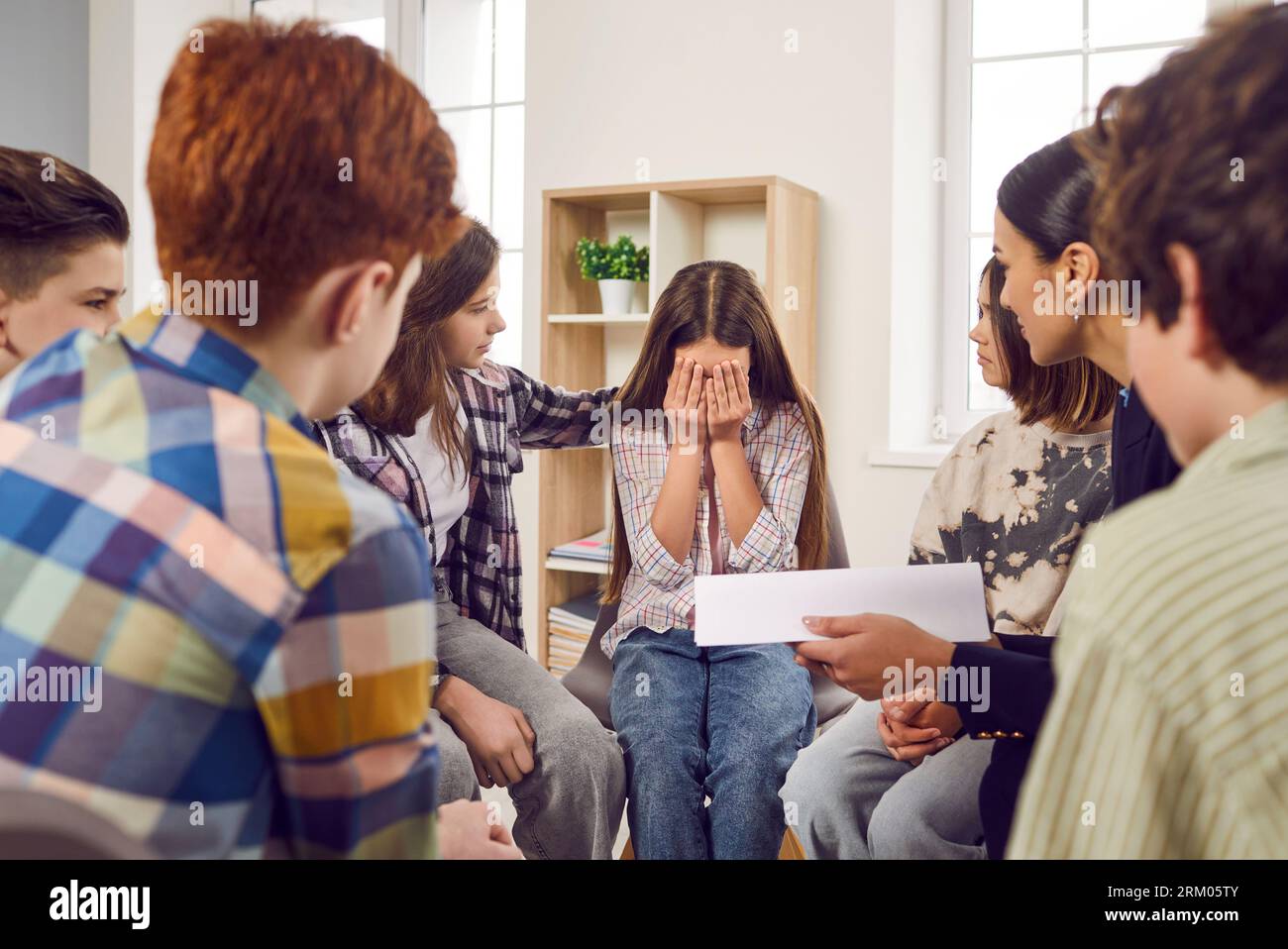 People Crying Together Stock Photo