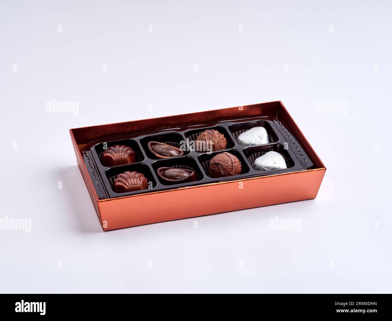 beautiful chocolate pieces in elegantly designed box Stock Photo - Alamy