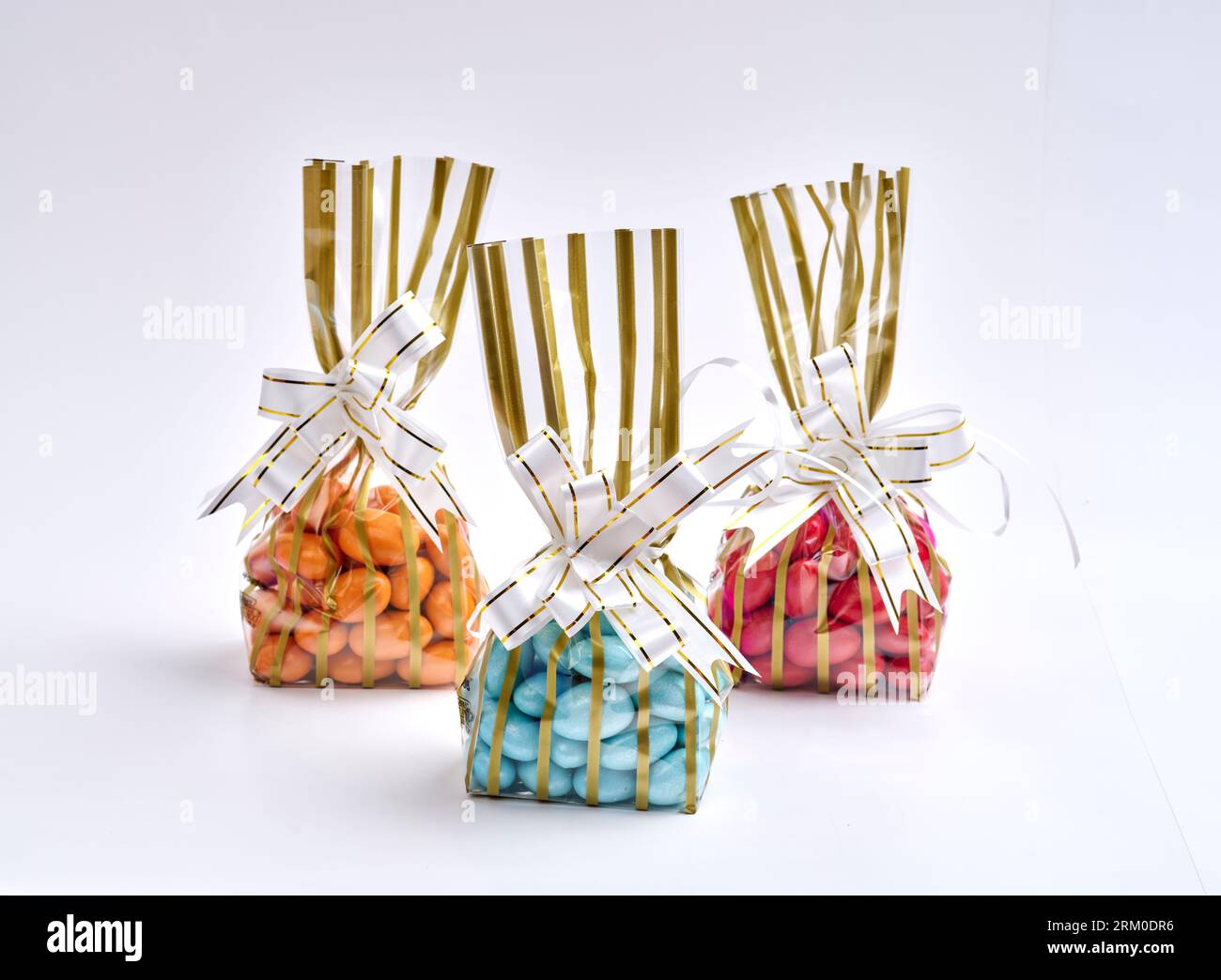 chocolate in mesh bag isolated on white background with a bow tie. rock ...