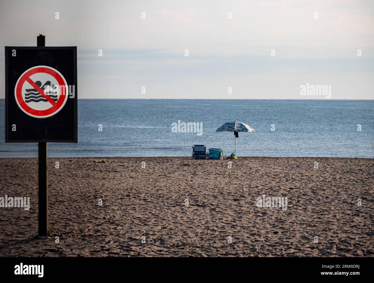 danger sharks seascape sign Stock Photo - Alamy