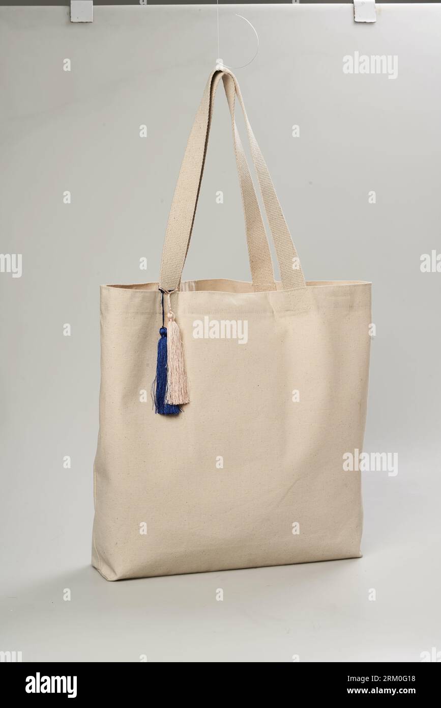 beautiful isolated picture of a multiple use cotton grocery bag. eco ...