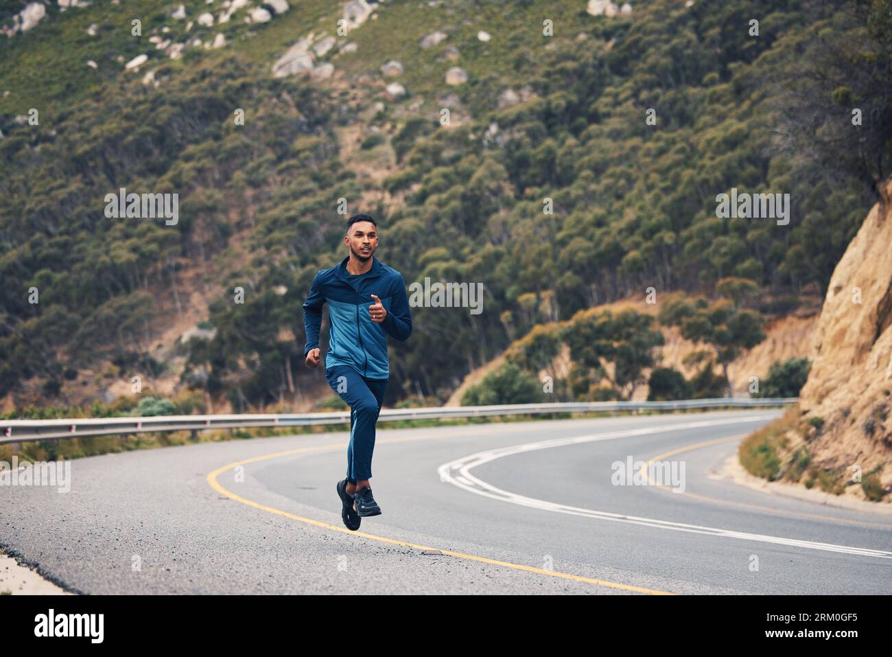 Runner man, sprint and mountain in street, nature and exercise for ...