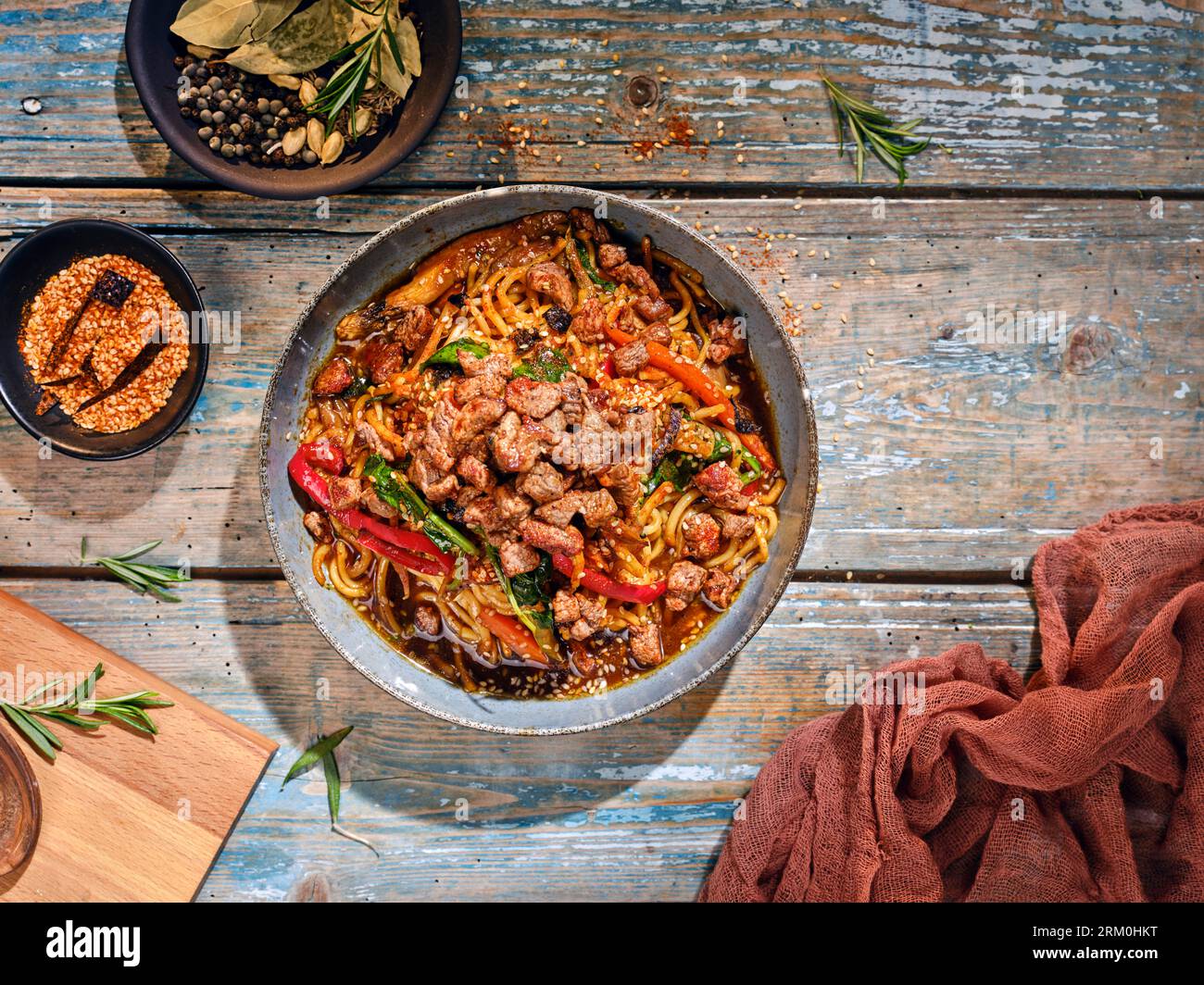 picture of a bowl of soup from the top with a nice wooden table ...