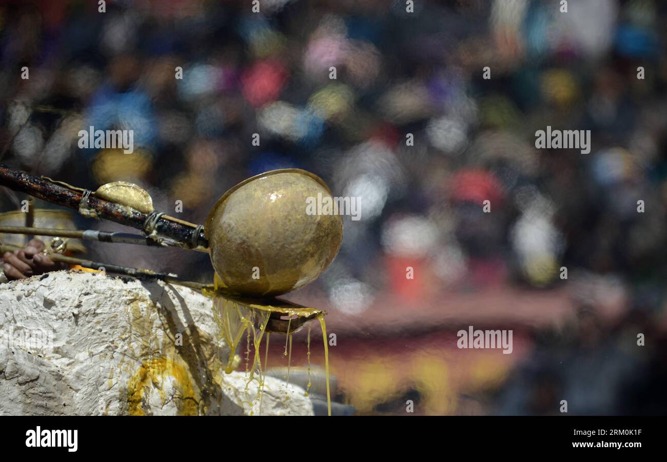 Ghee fire ceremony hi-res stock photography and images - Alamy