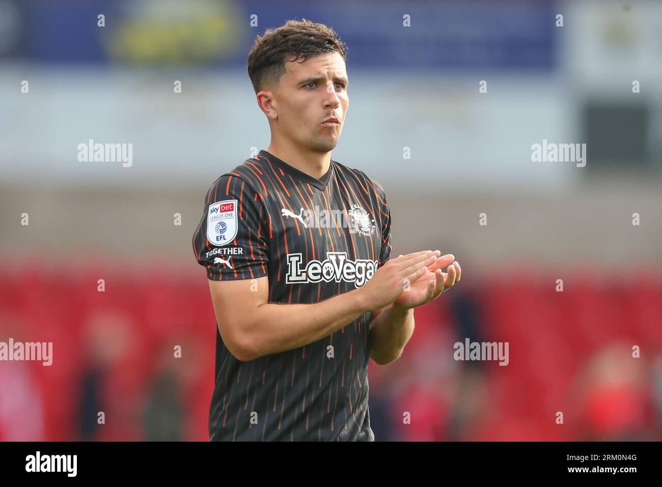 Albie Morgan #8 of Blackpool applauds the travelling fans after the Sky ...