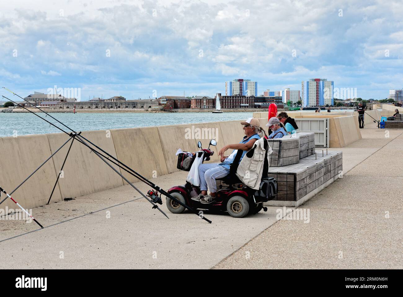 Sitting using disability scooter hi-res stock photography and images ...