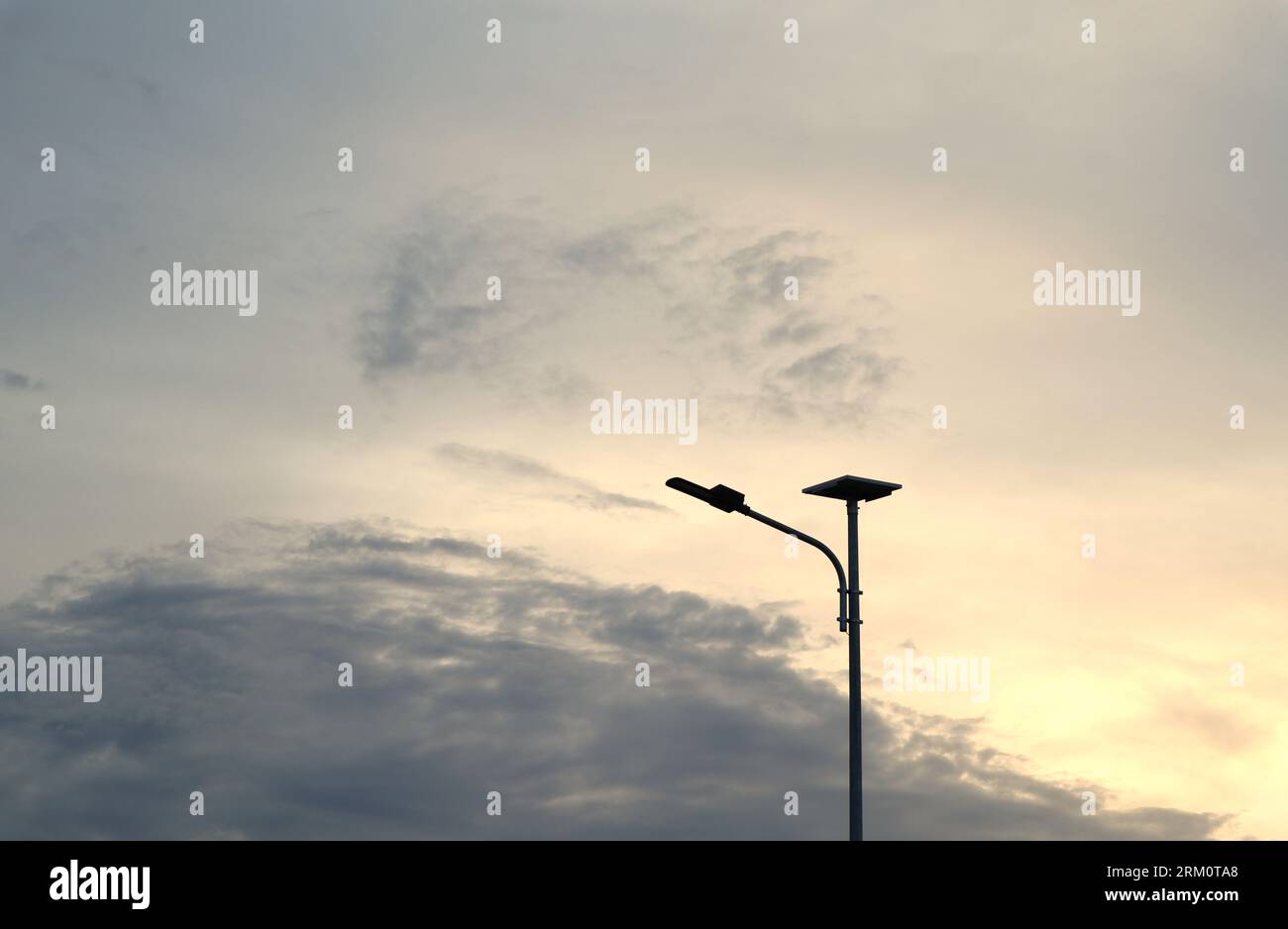 street light isolated with dramatic sky background Stock Photo - Alamy
