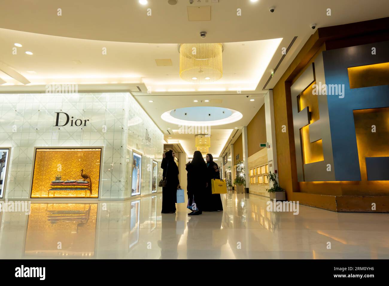 Moda Mall - Bahrain. Bahrain women beside Dior, Fendi boutiques Stock ...