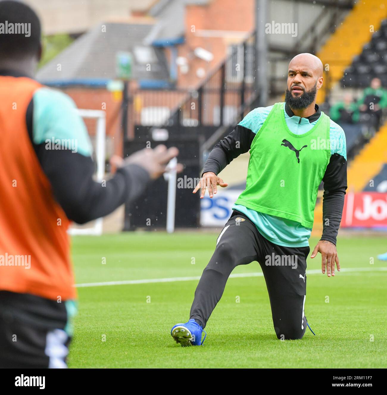 Nottingham, UK. 26th Aug, 2023. Notts County's David McGoldrick warms ...