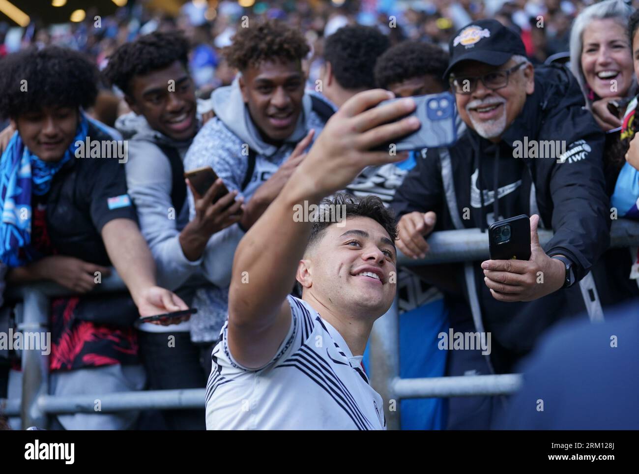 Fiji’s Caleb Muntz takes selfies with fans following the Summer Nations ...