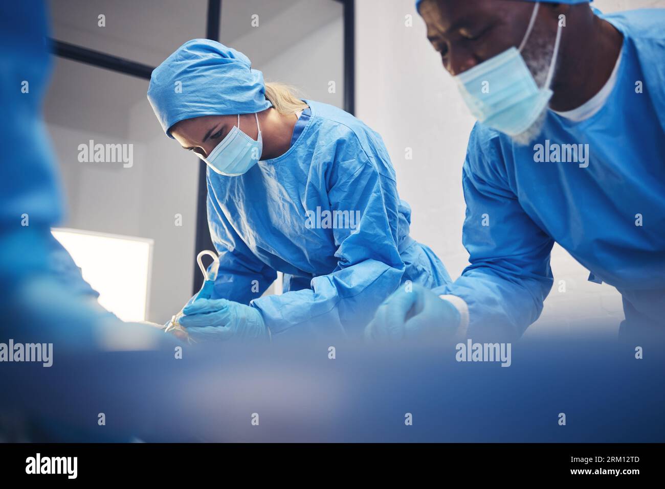 Surgery team, hospital or surgeon operation, emergency services and ...