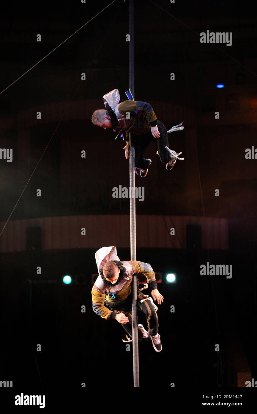 Pylon artists of the National Circus of Ukraine performing risky trick ...