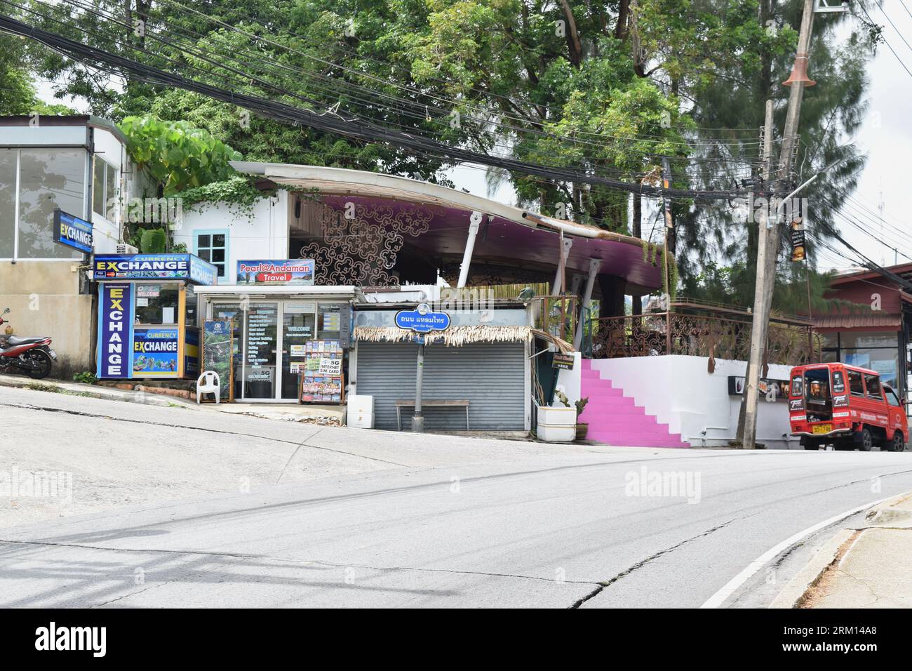Phuket street view with electric wires and currency exchange Stock ...