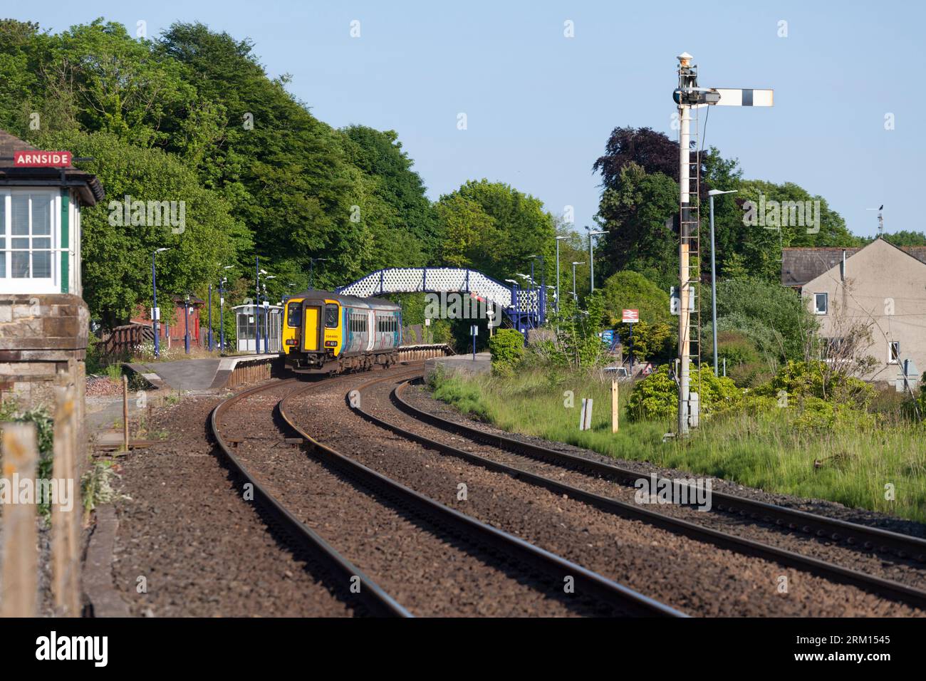 Northern Rail class 156 sprinter train at Arnside railway station with ...