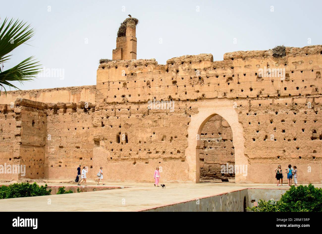 Marrakech, Morocco, April 8th, 2023. Tourists standing near an ancient ...