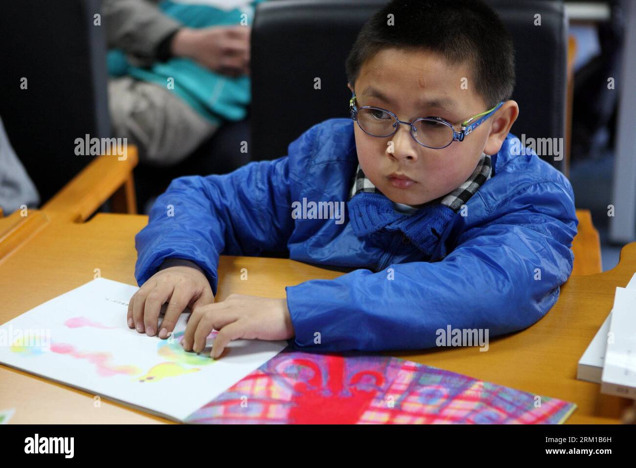 Child reading braille hi-res stock photography and images - Alamy