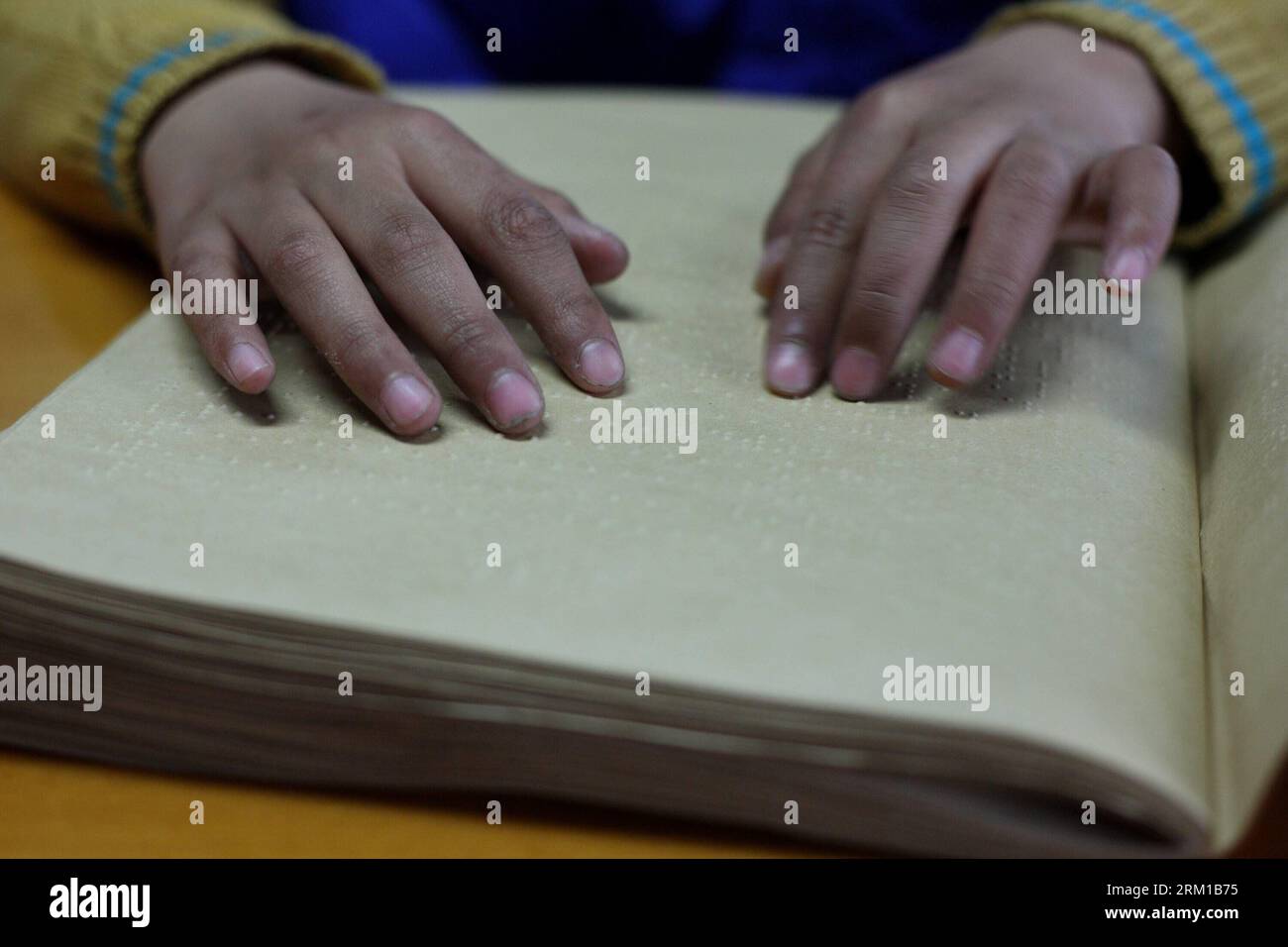 Child reading braille hi-res stock photography and images - Alamy