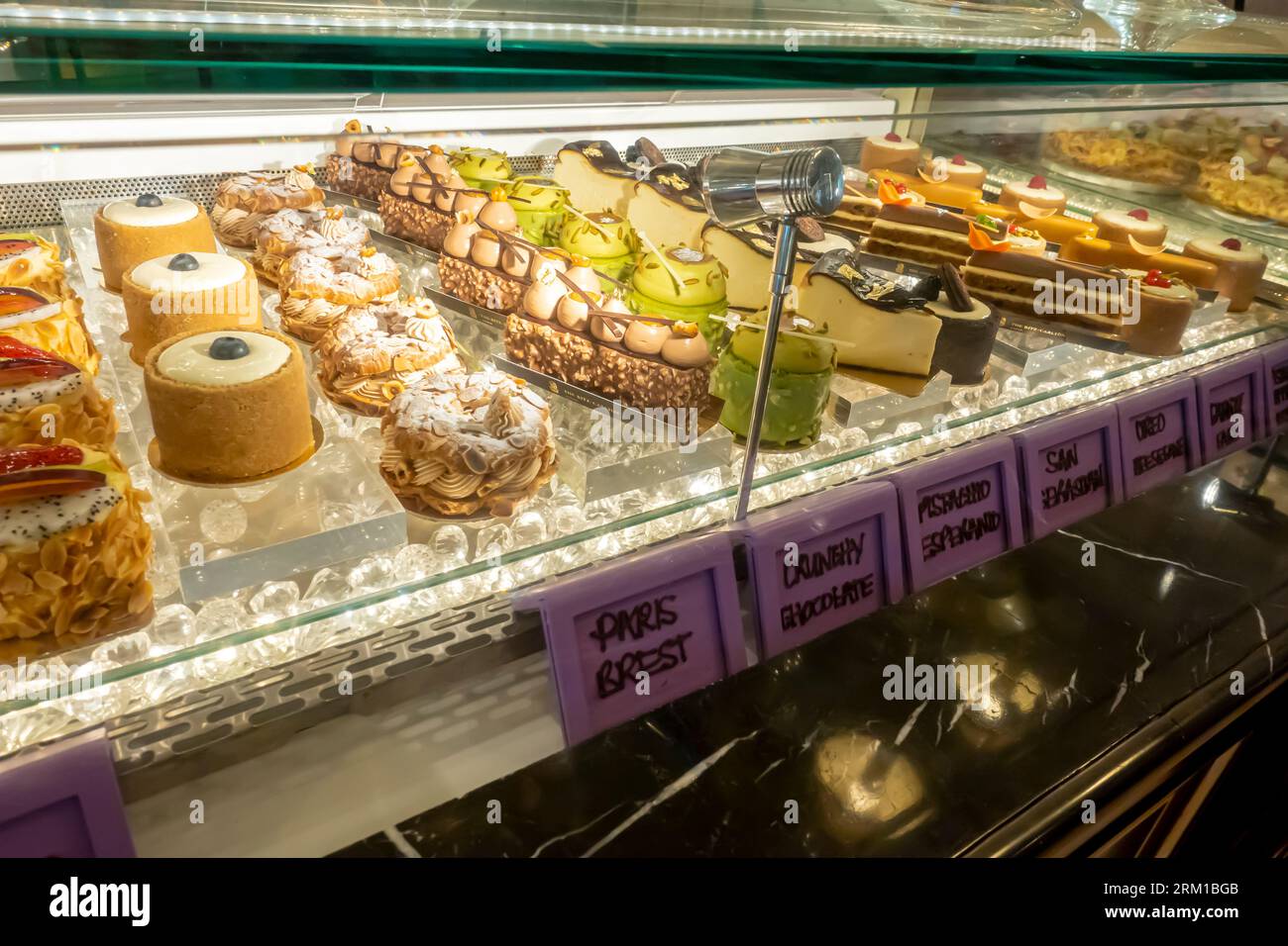 Cakes display, sweets shop, desserts display in Gourmet Lounge Ritz ...