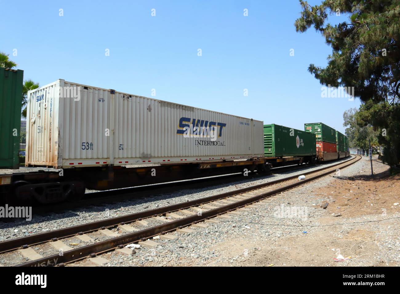Freight train with SWIFT Container blocks Stock Photo - Alamy