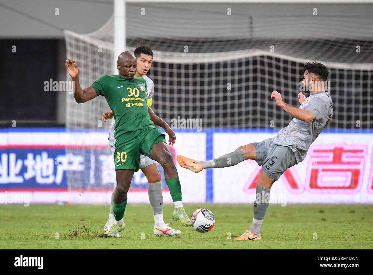 Hangzhou, China. 22nd Aug, 2023. Nyasha Mushekwi (C) of Zhejiang FC and ...
