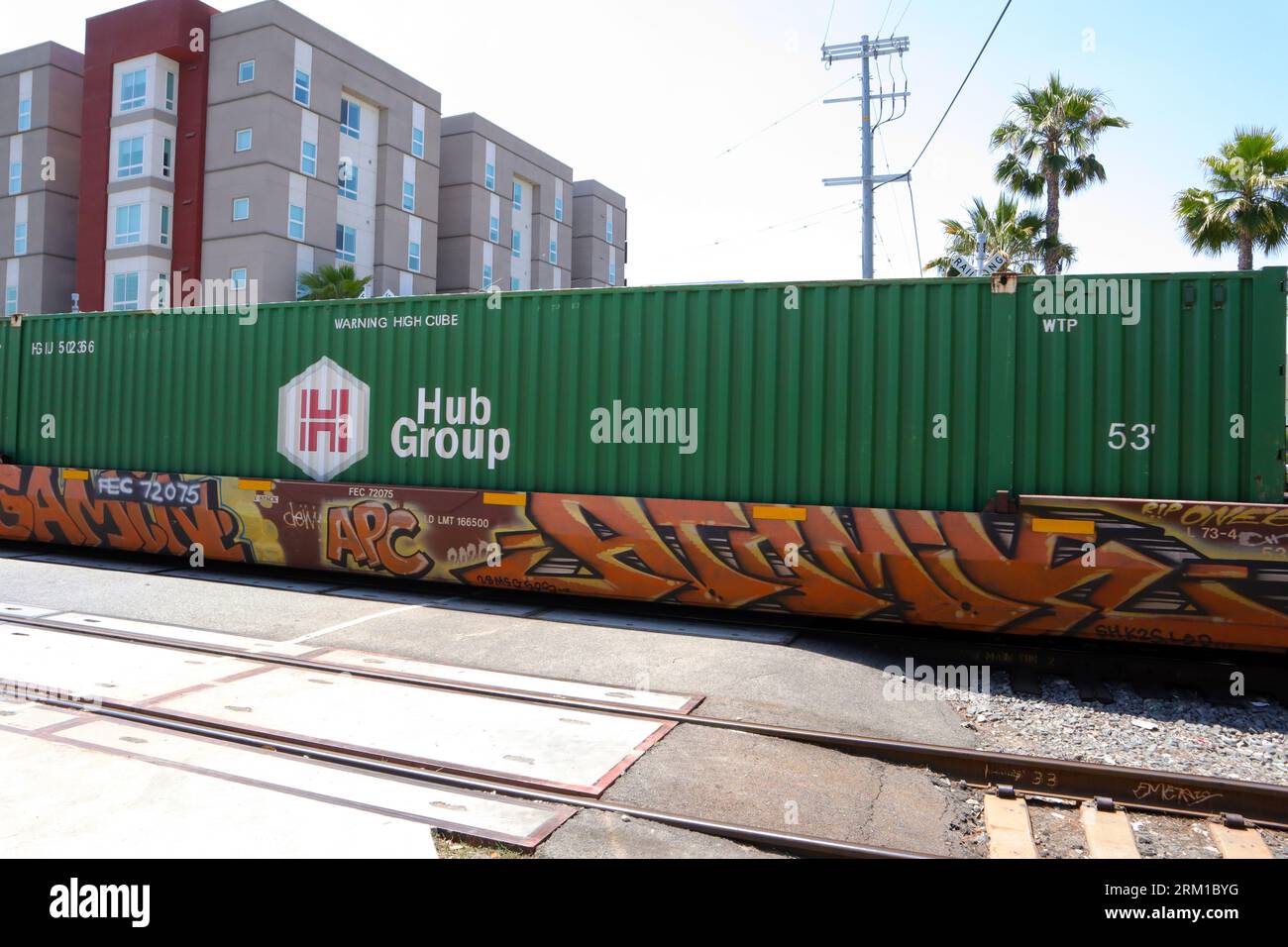 Freight train with HUB GROUP Container blocks Stock Photo - Alamy