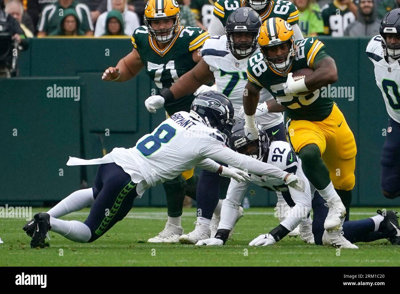 Green Bay Packers running back AJ Dillon (28) runs from Seattle ...