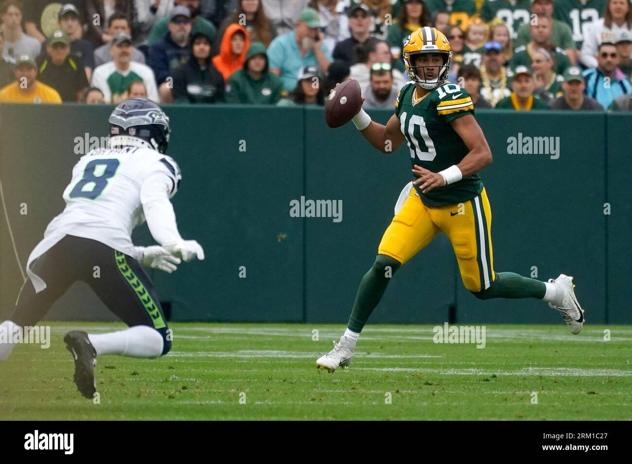 Green Bay Packers quarterback Jordan Love (10) runs from Seattle ...
