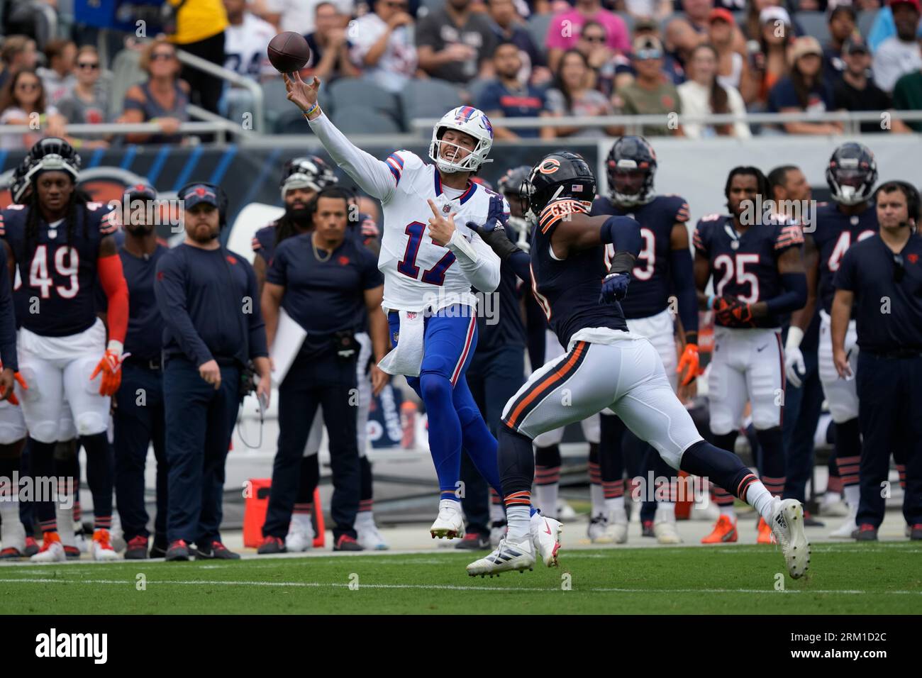 Buffalo Bills quarterback Josh Allen (17) throws under pressure from ...