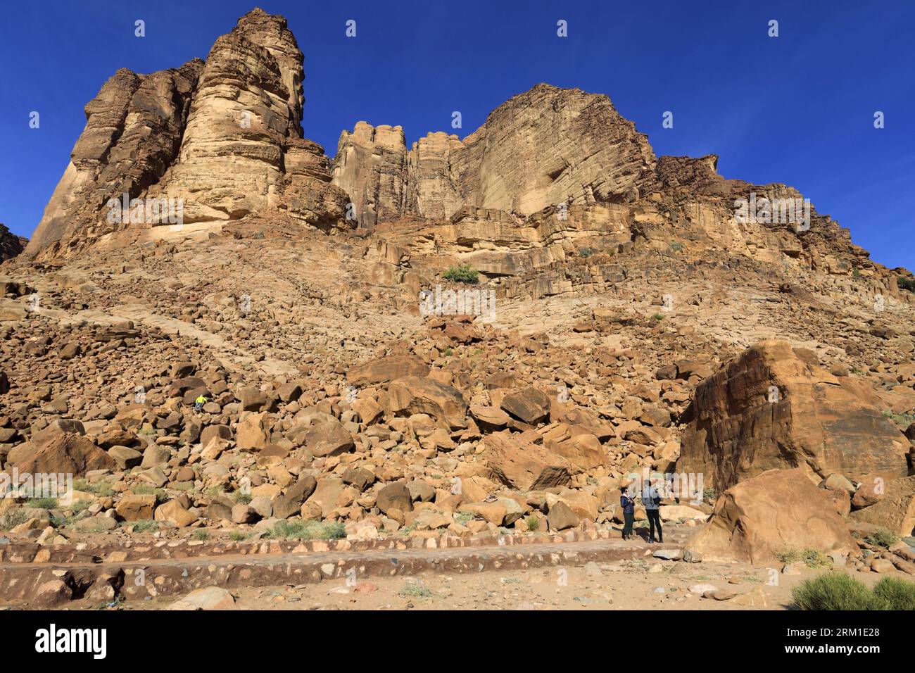 Tourists at Lawrence's Spring, Wadi Rum, Jordan, Middle East Stock ...