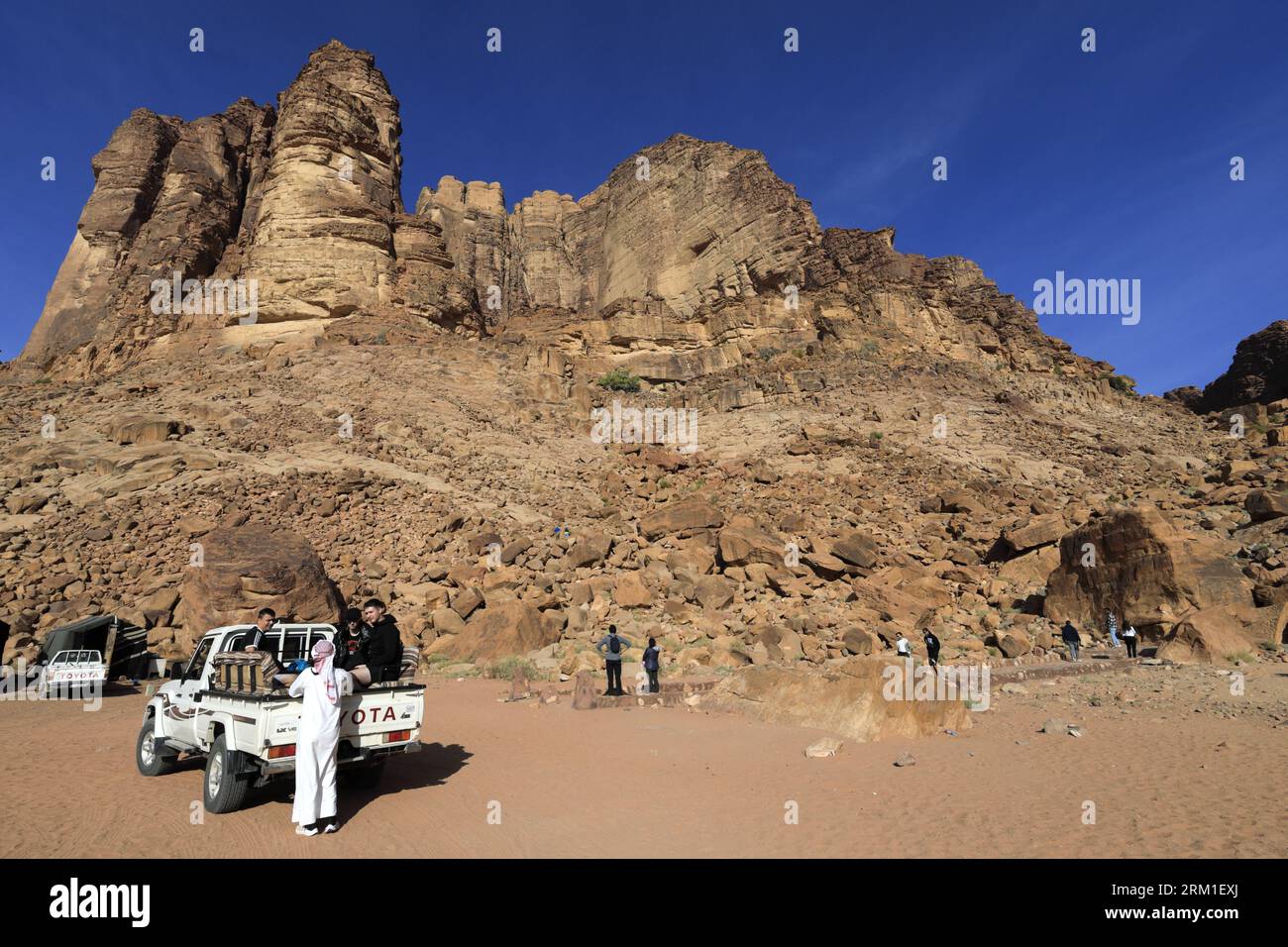 Tourists at Lawrence's Spring, Wadi Rum, Jordan, Middle East Stock ...