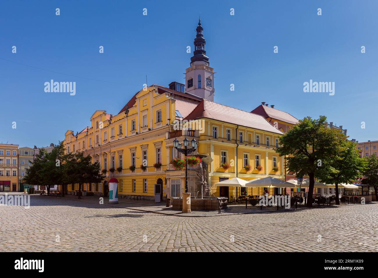 Old medieval market square and facades of traditional colorful houses ...