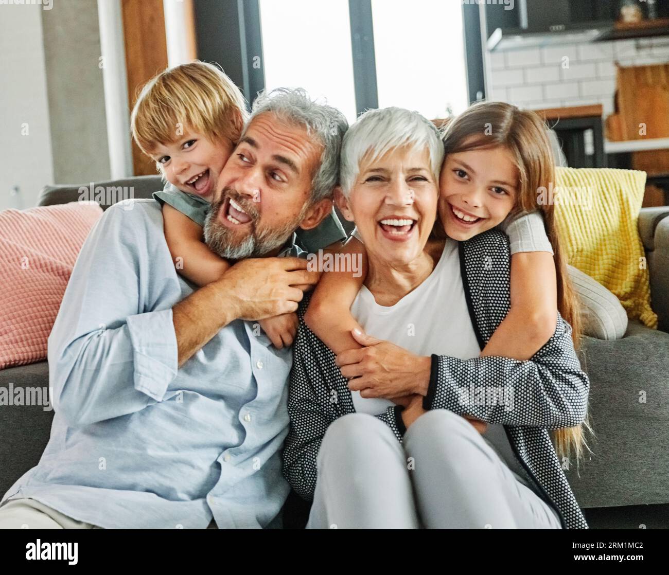 grandchild family child grandparent man woman grandfather happy ...