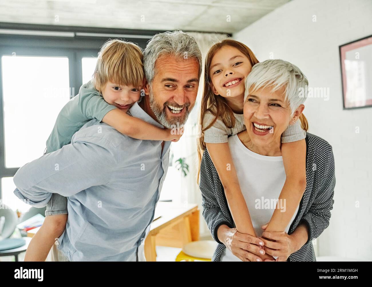 grandchild family child grandparent man woman grandfather happy ...