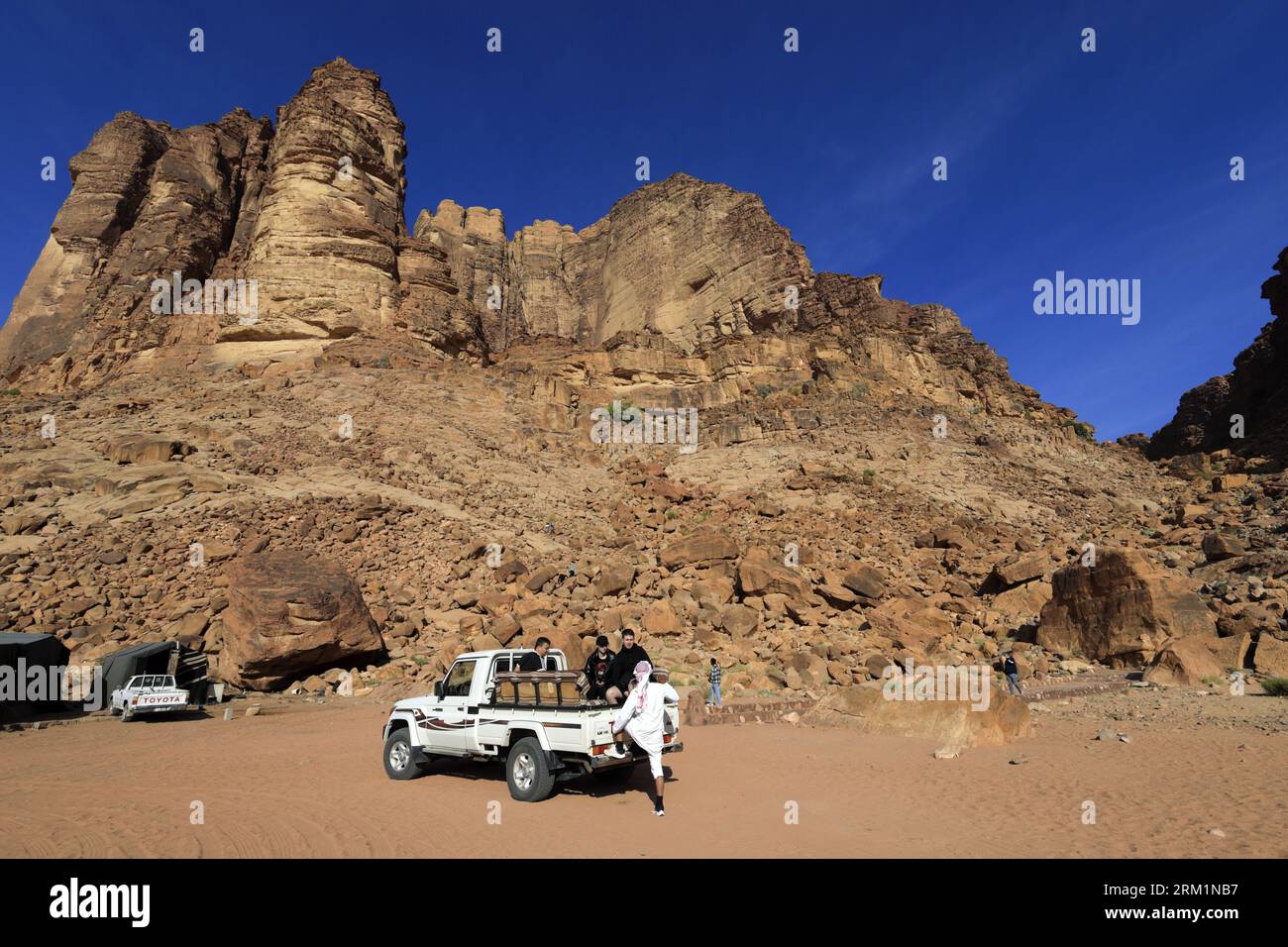 Tourists at Lawrence's Spring, Wadi Rum, Jordan, Middle East Stock ...