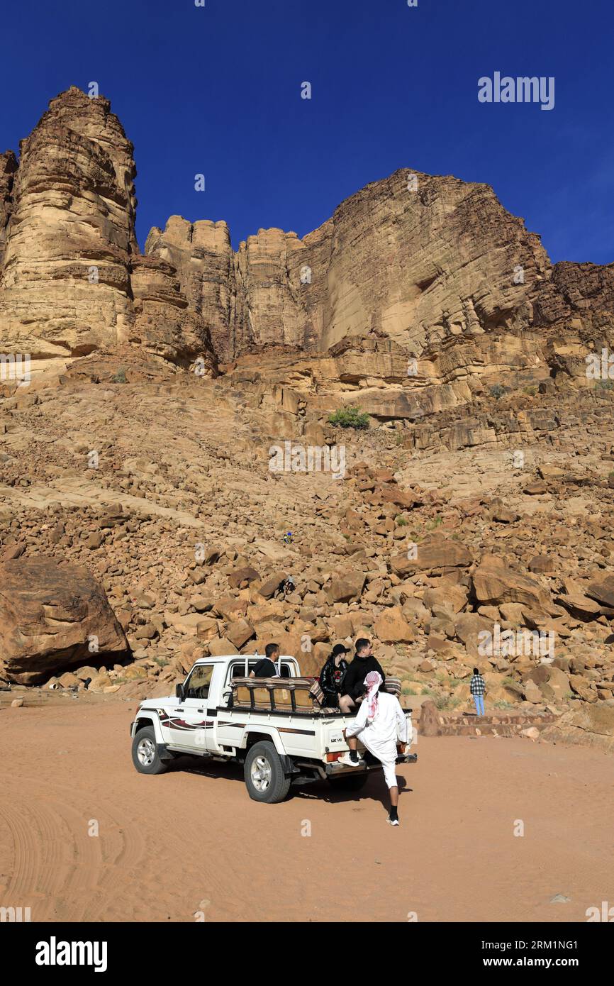 Tourists at Lawrence's Spring, Wadi Rum, Jordan, Middle East Stock ...