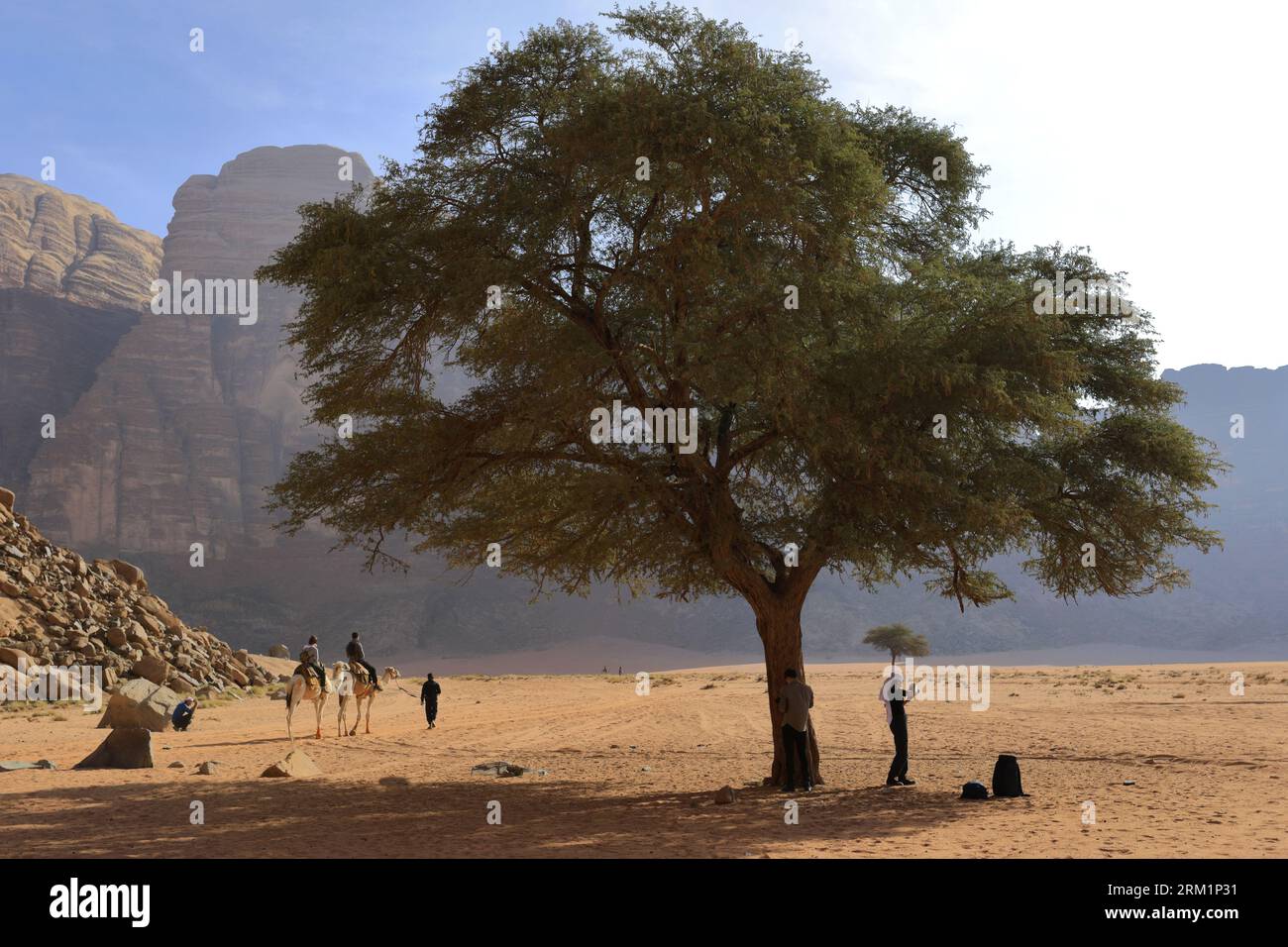 Tourists at Lawrence's Spring, Wadi Rum, Jordan, Middle East Stock ...