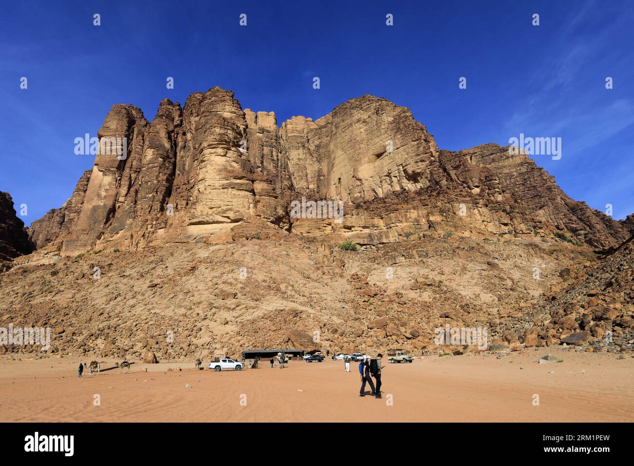 Tourists at Lawrence's Spring, Wadi Rum, Jordan, Middle East Stock ...