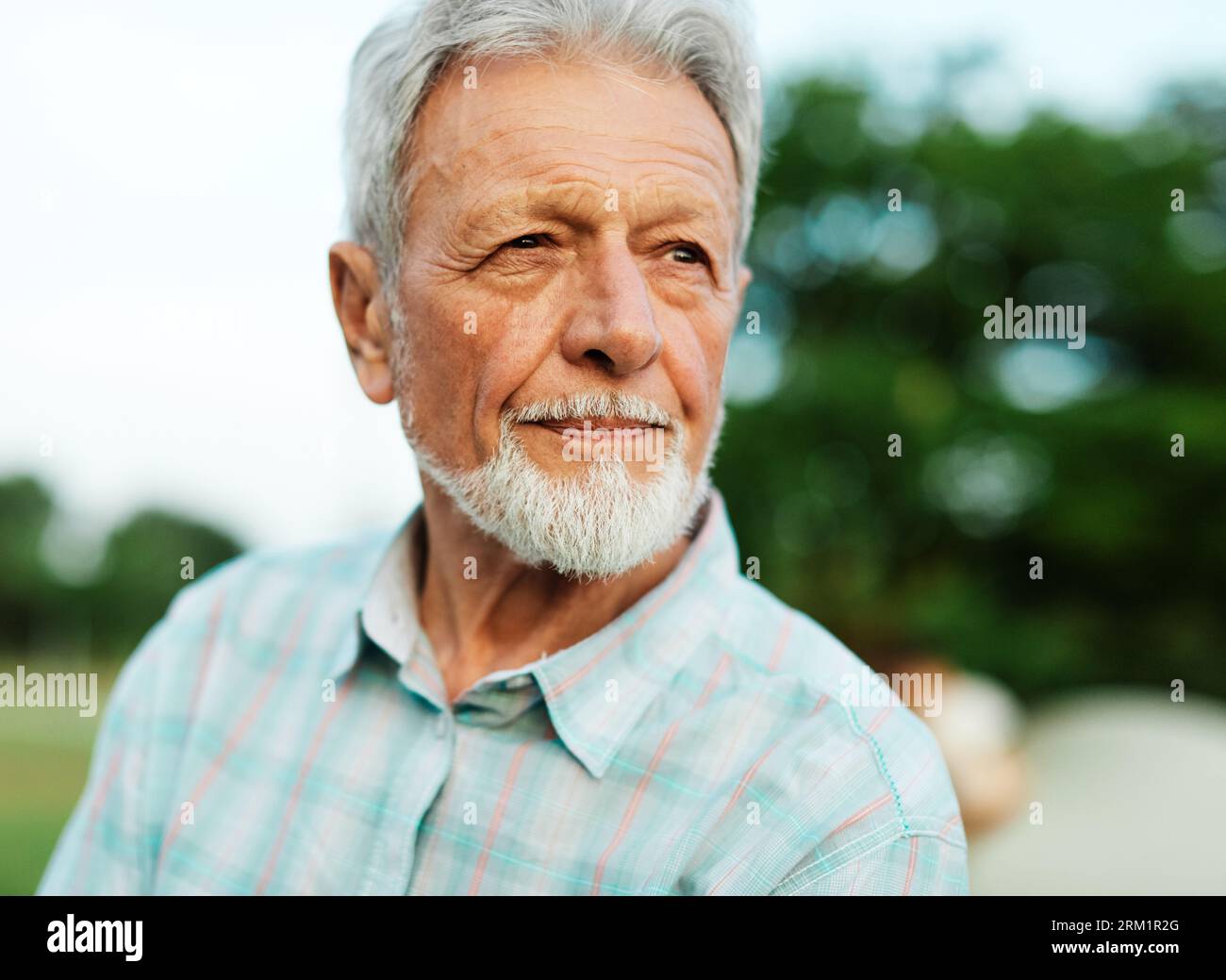 man outdoor senior happy retirement elderly portrait male active park ...