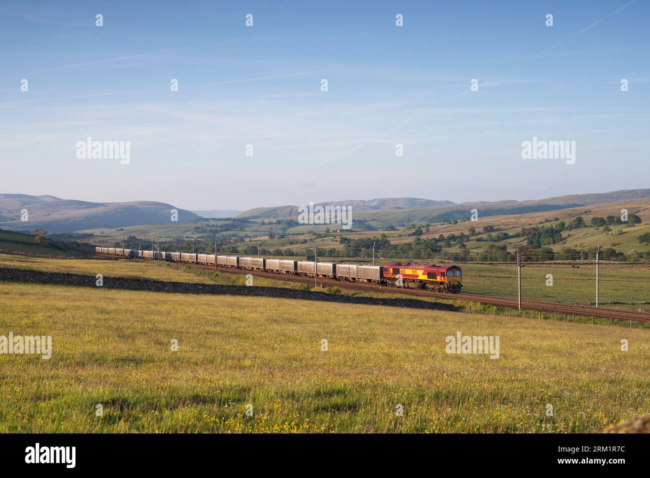 DB cargo Class 66 locomotive on the west coast main line in Cumbria at ...
