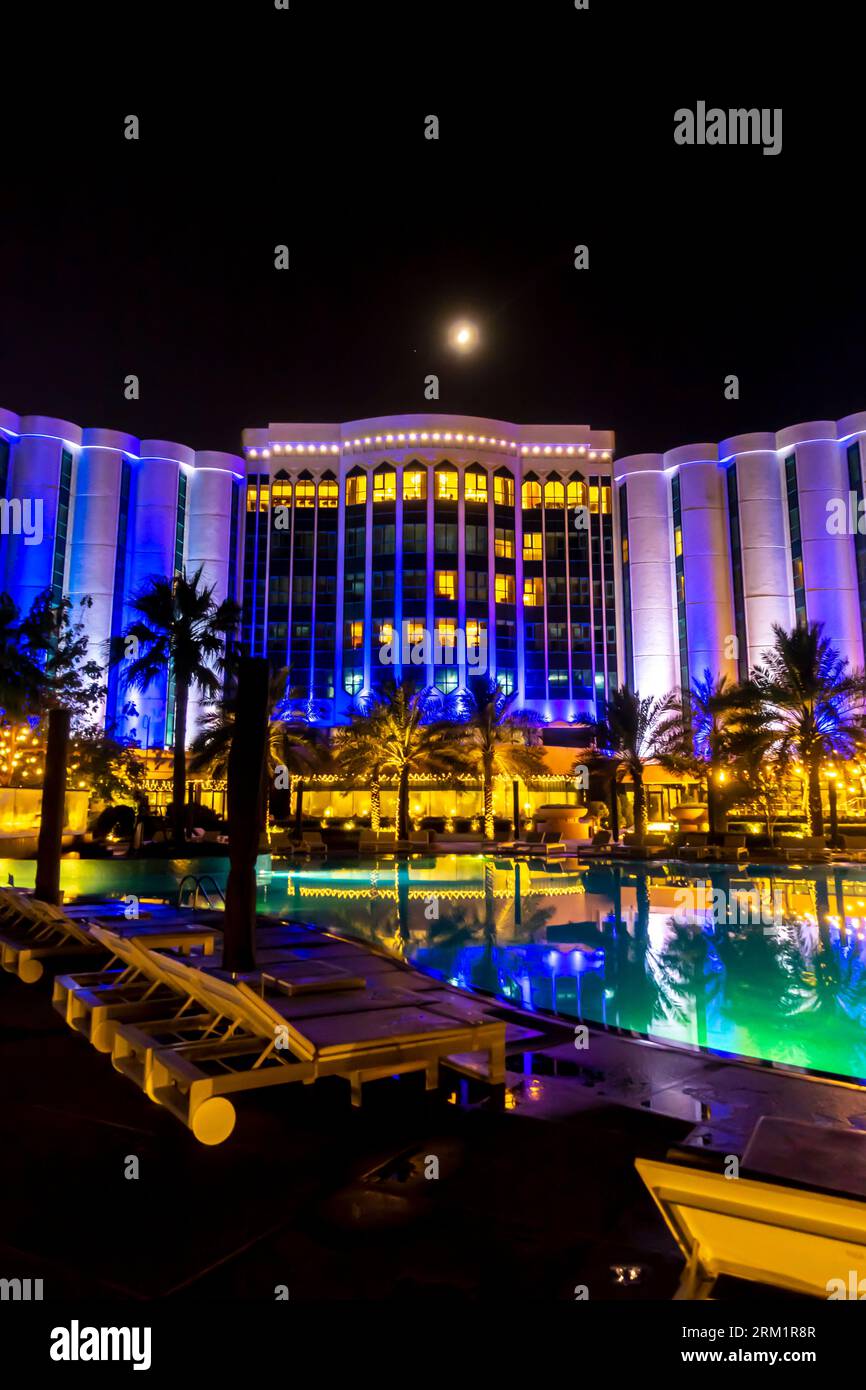 The Ritz-Carlton Bahrain, lit at night.View from the pools area, resort ...