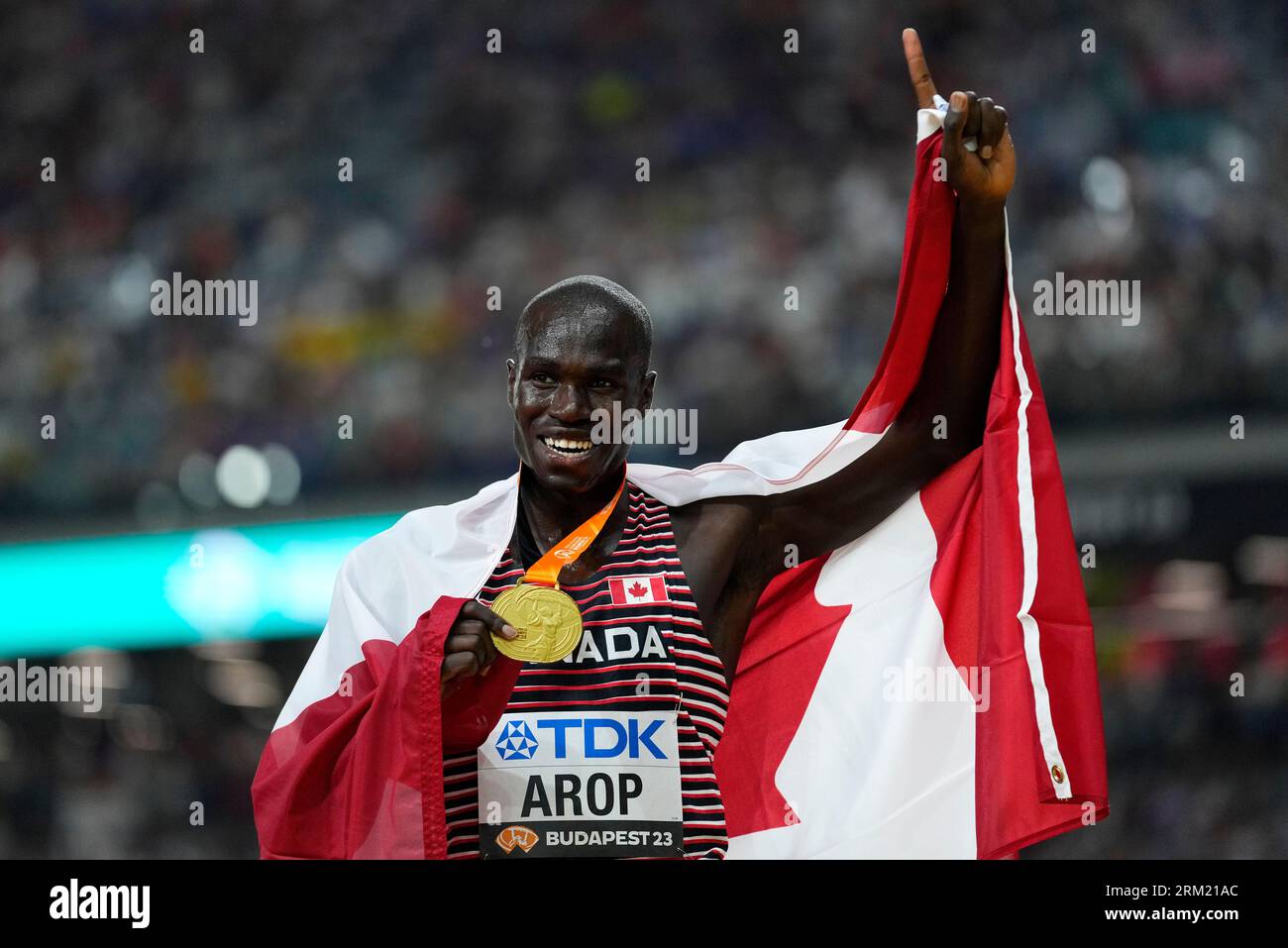 Marco Arop, of Canada celebrates winning the gold medal in the Men's ...