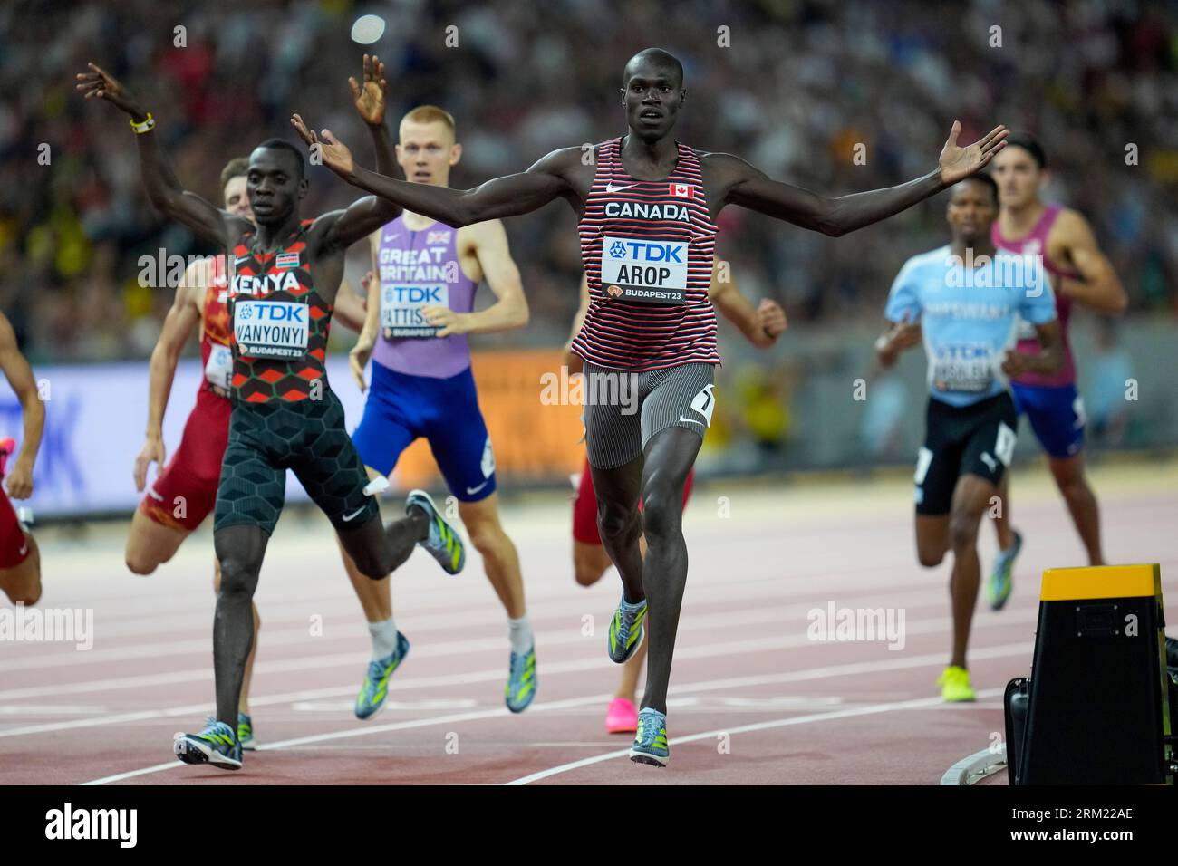 Marco Arop, of Canada celebrates winning the gold medal ahead of ...