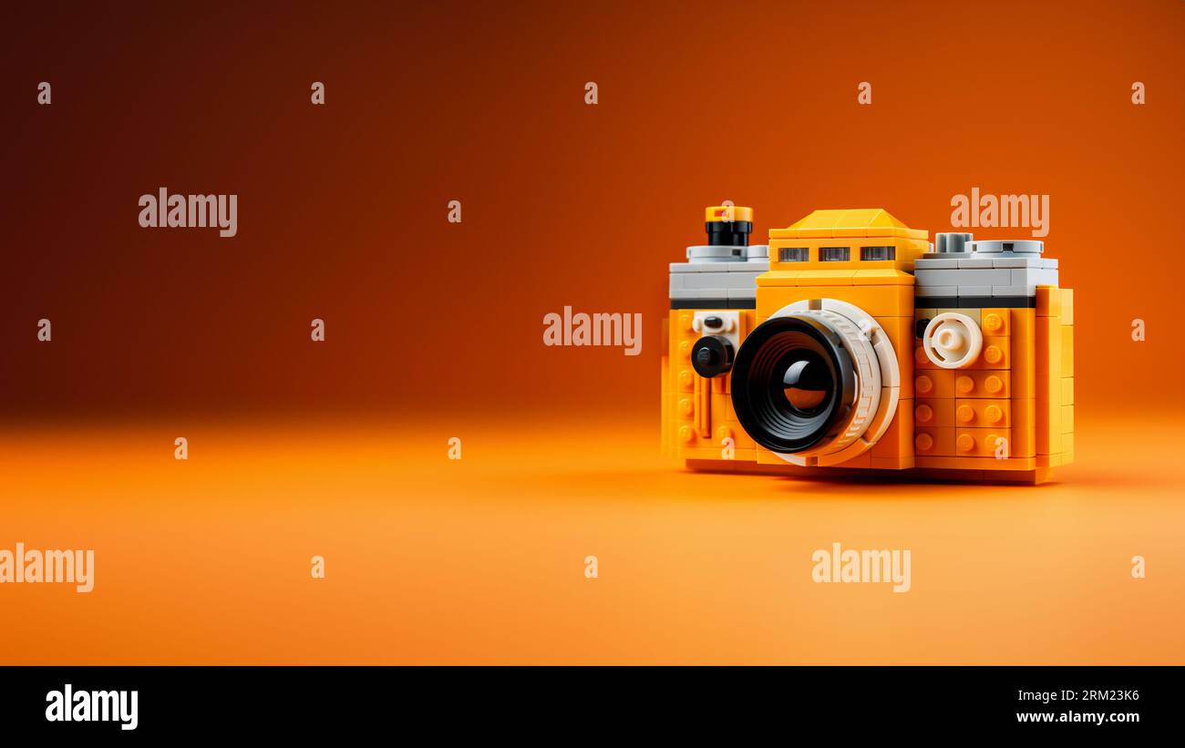 3D Toy camera made of plastic block toys with orange color Stock Photo ...