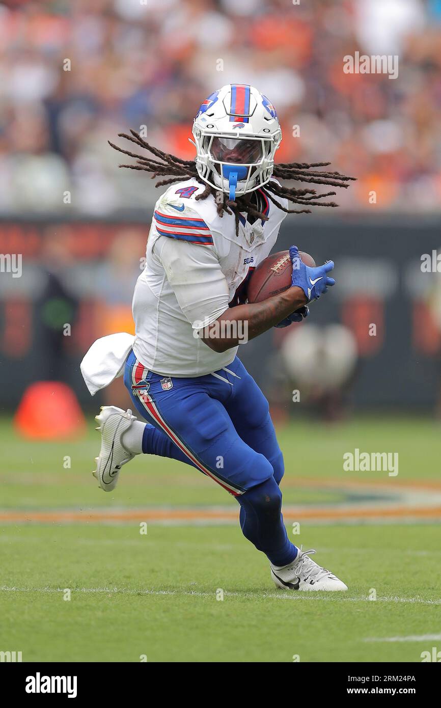 Buffalo Bills running back James Cook (4) runs in action after making a ...