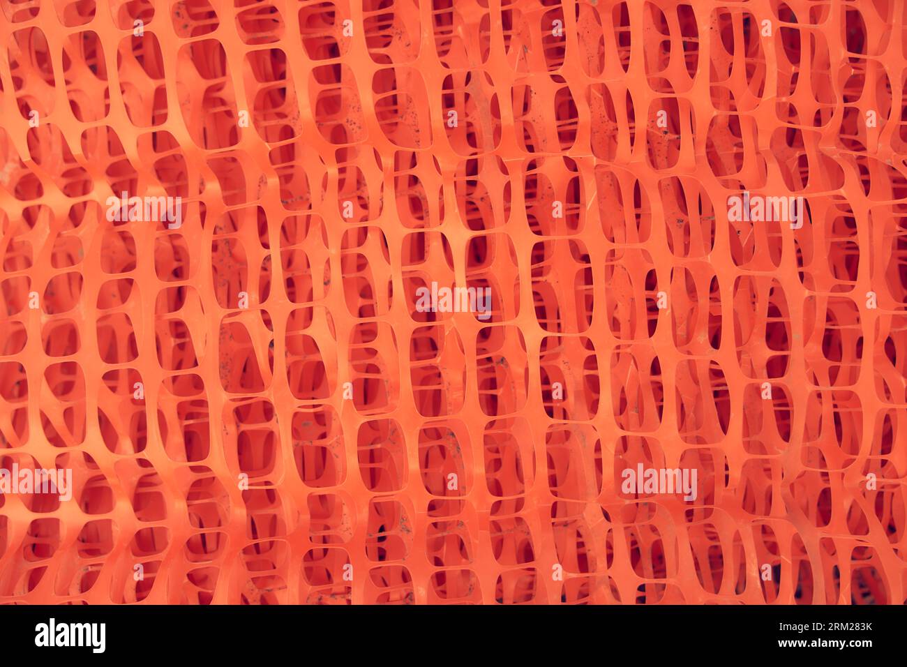 A roll of orange plastic protective barrier mesh. Plastic mesh for ...