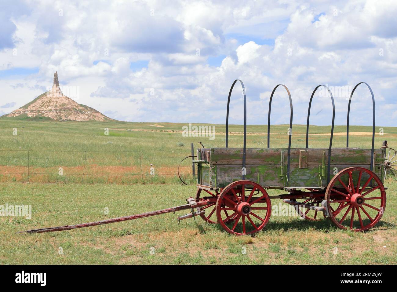 Chimney Rock, Nebraska, with a Conestoga wagon in the foreground Stock ...