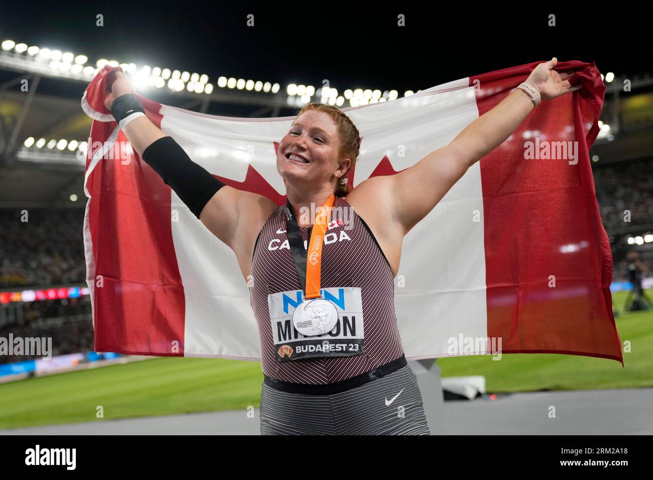 Sarah Mitton, of Canada, poses after after winning the silver medal in ...