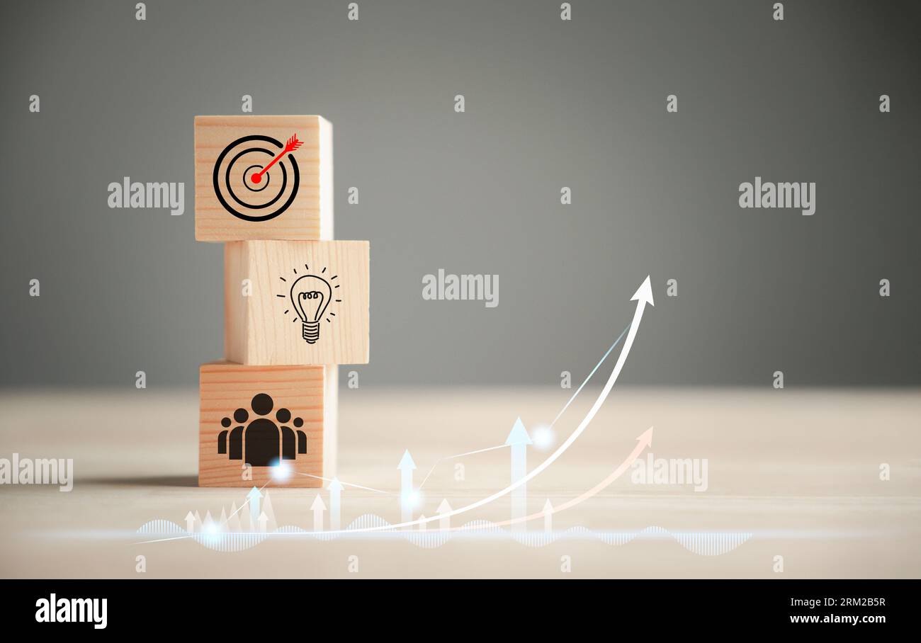 Wooden block cude step on table with Action Plan Stock Photo - Alamy